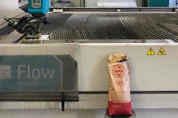 High precision waterjet cutting garnet for German military university